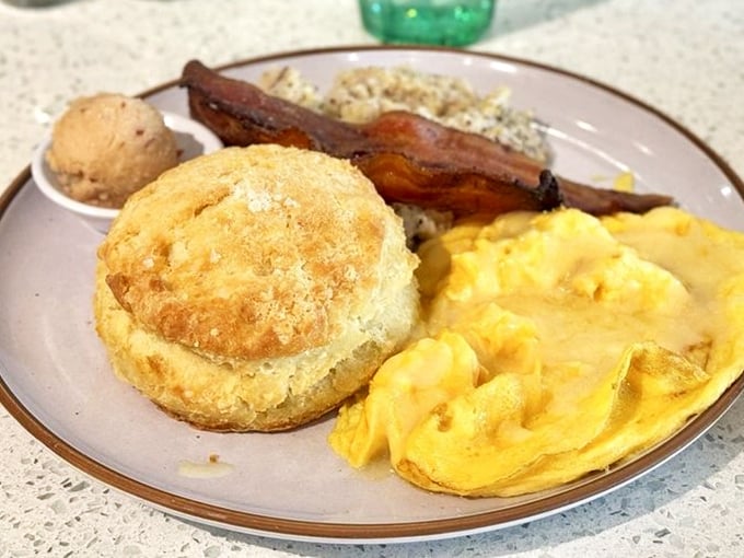 The holy trinity of Southern breakfast: a golden biscuit, fluffy scrambled eggs, and bacon that strikes that perfect balance between crispy and chewy.