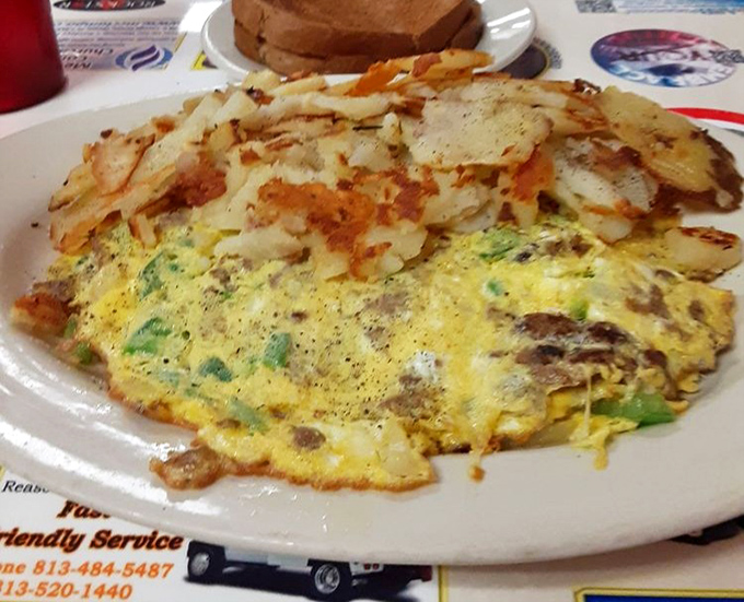 When home fries meet perfectly cooked eggs, it's like a breakfast symphony where every bite plays its part in perfect harmony.