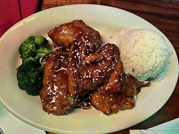 Glistening honey chicken that would make your grandmother jealous. Paired with rice and broccoli, it's comfort food with an island twist.