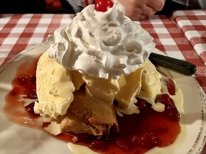 Dessert that makes grown adults giggle with anticipation. This towering creation is what childhood dreams and adult indulgences are made of.