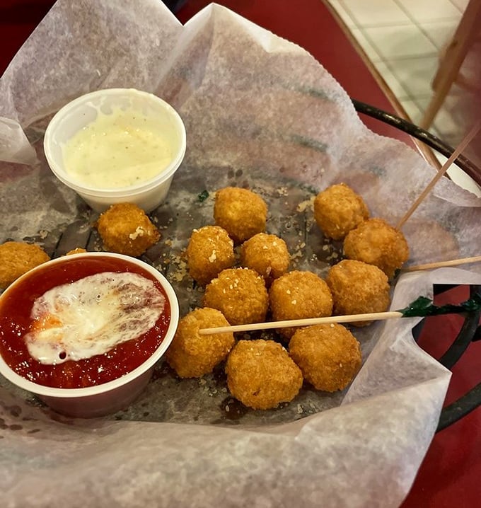 The legendary hot cheese balls in their natural habitat&mdash;golden, crispy outside, molten inside, and worth every mile of the drive.
