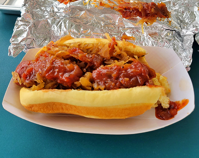 The hot dog that launched a thousand detours. Topped with what appears to be chili and onions, it's worth every mile of the journey.