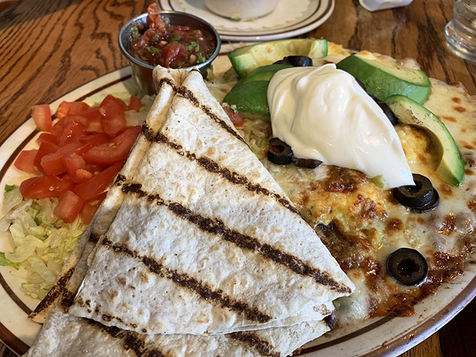 Not your abuela's huevos rancheros, but she'd still approve of this colorful fiesta plate where crisp tortillas meet melty cheese and fresh avocado.