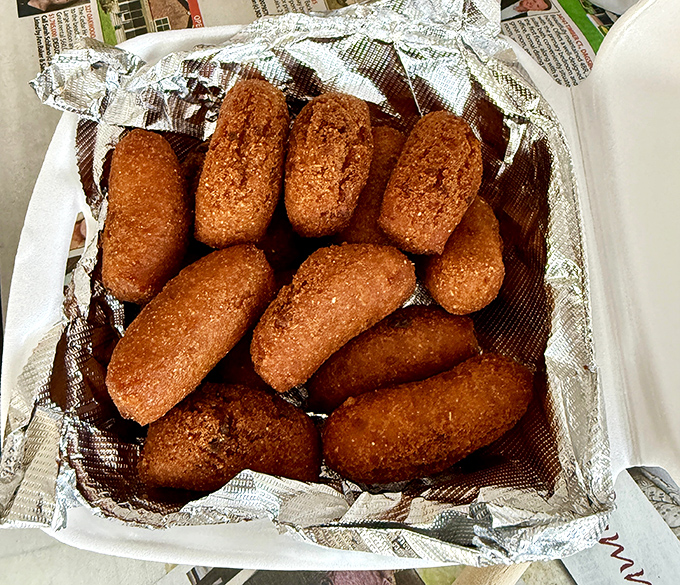 Hush puppies so perfectly fried they deserve their own fan club. These golden nuggets are the ideal sidekick to any seafood feast.