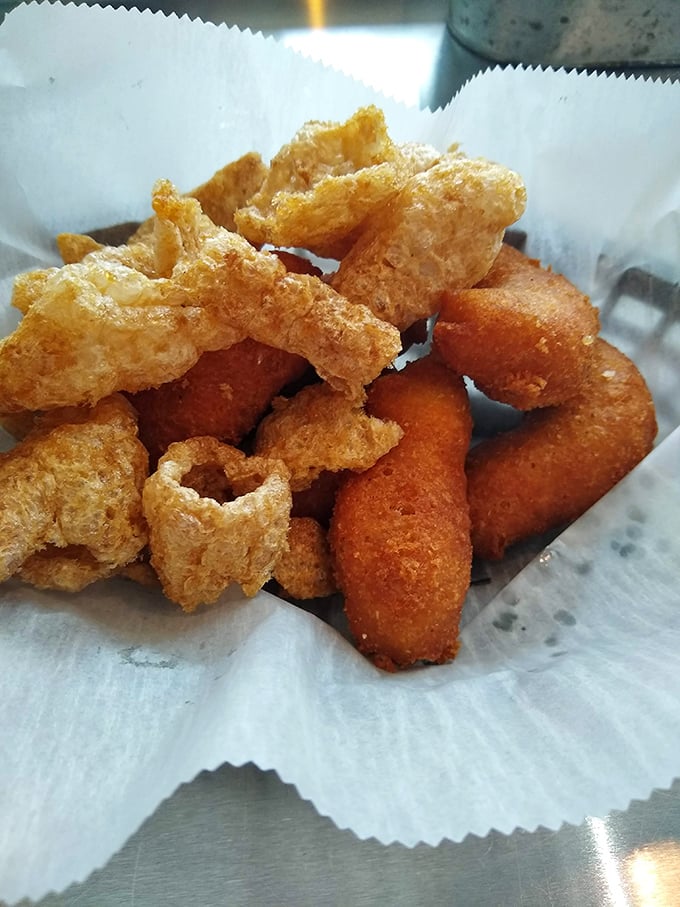 Golden-fried hush puppies that crunch like autumn leaves. These cornmeal treasures are the unsung heroes of any proper barbecue feast.