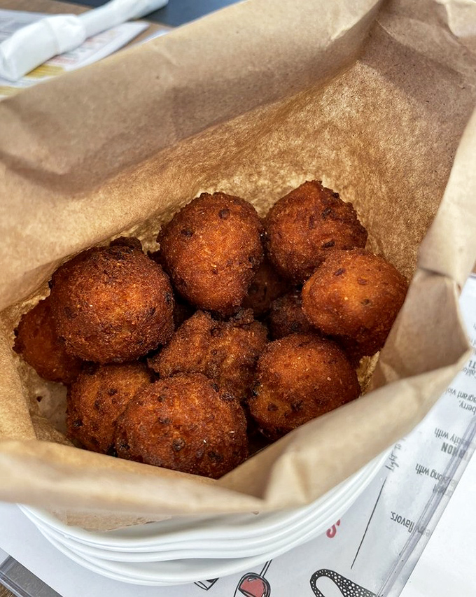 Hush puppies that don't know how to whisper. These golden-fried beauties practically shout "Get in my belly!" with every bite.