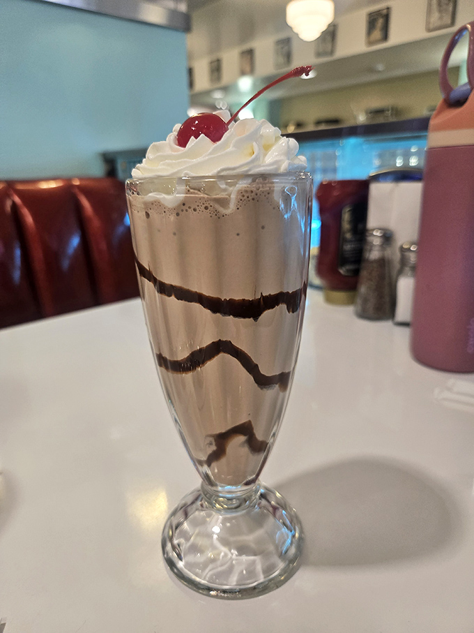 This towering ice cream soda proves that some childhood dreams are worth revisiting as adults.