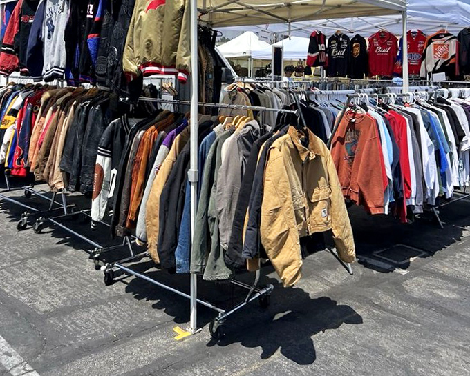 Vintage jackets hang like historical documents, each with stories stitched into their fabric, waiting for new chapters to be written. 