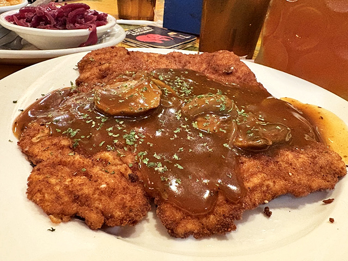 Schnitzel so perfectly golden it deserves its own Olympic medal. The mushroom gravy? That's just showing off.