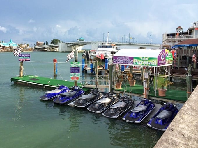 Water toys lined up like candy in a store window. These jet skis promise the kind of freedom only found when skimming across open water.