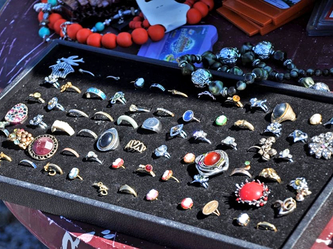 Vintage bling that tells stories. Each ring and pendant carries whispers of past celebrations, waiting for new fingers and necks to adorn.