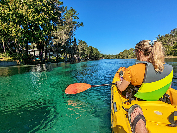 Kayaking the Rainbow River: where every paddle stroke feels like you're gliding through liquid sapphires. No Instagram filter required.