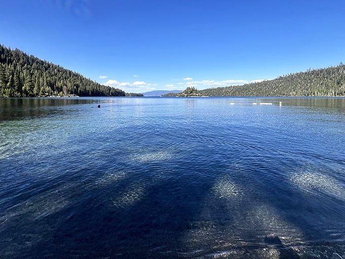 Emerald Bay sparkles like a jewel in Lake Tahoe's crown. This pristine alpine water is so clear you can count pebbles twenty feet below the surface.