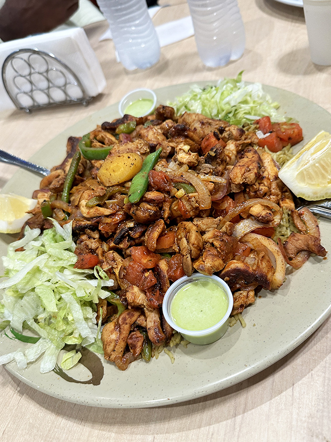Not just chicken&mdash;a celebration on a plate. Colorful, aromatic, and served with that magical green sauce that could make cardboard taste delicious.