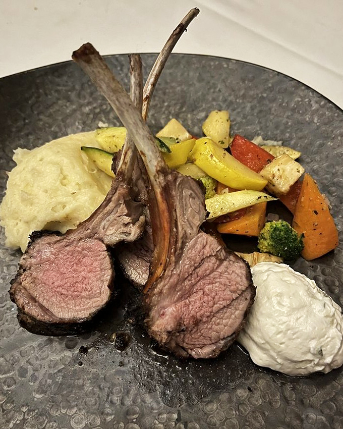 These lamb chops aren't just cooked&mdash;they're respected. Perfectly pink, artfully presented, and making those vegetables feel like they've been invited to the cool table.