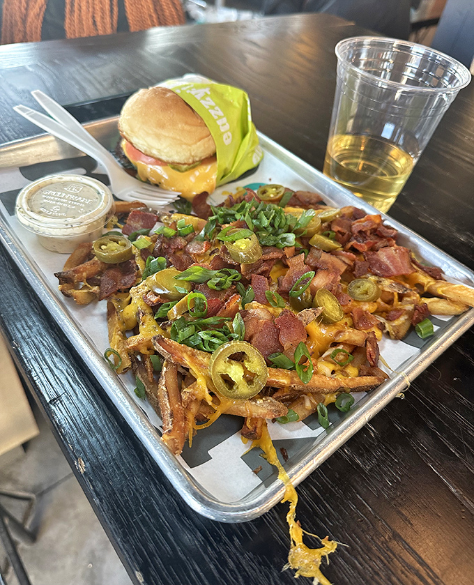 Loaded fries that could be a meal themselves&mdash;bacon, cheese, jalape&ntilde;os, and green onions creating a flavor party worth the extra napkins.