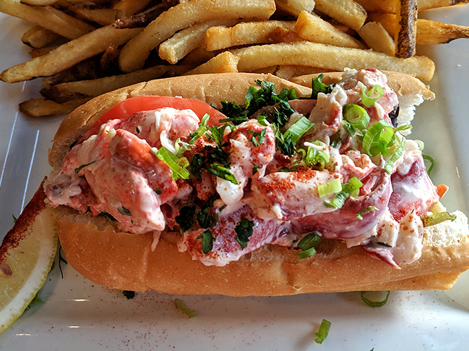 Not just a lobster roll, but a love letter to the sea. Chunks of sweet lobster meat nestled in a perfect bun—simplicity that speaks volumes.