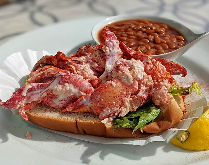 Not all heroes wear capes, but this lobster roll&mdash;overflowing with sweet meat and served with baked beans&mdash;definitely deserves a medal.