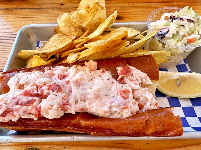 The perfect lobster roll doesn't exi&mdash; Oh wait, here it is! Chunks of sweet meat nestled in buttery bread with homemade chips standing guard.