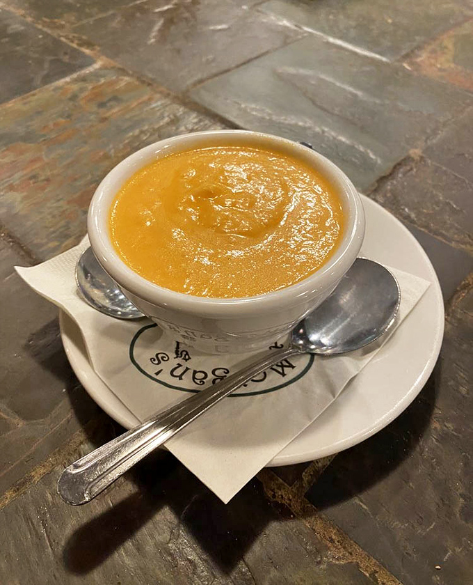 This butternut squash soup isn't just a starter – it's a warm hug in a bowl, velvety and rich enough to make you forget your table manners.