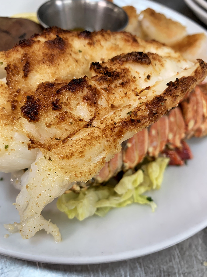 Twin lobster tails that prove this diner plays in the big leagues when it comes to seafood.