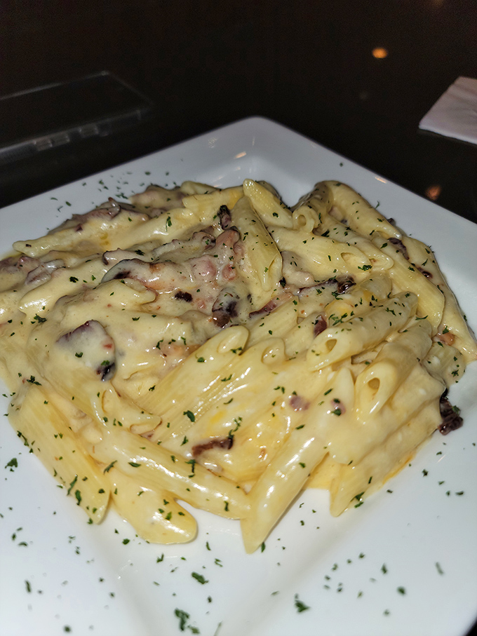 Mac and cheese elevated to art form, where every creamy strand whispers sweet nothings to your taste buds.