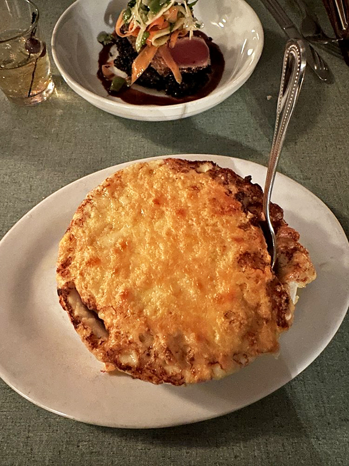 The legendary macaroni au gratin isn't just comfort food&mdash;it's a bubbling, golden masterpiece that's sparked more love affairs than a dating app.