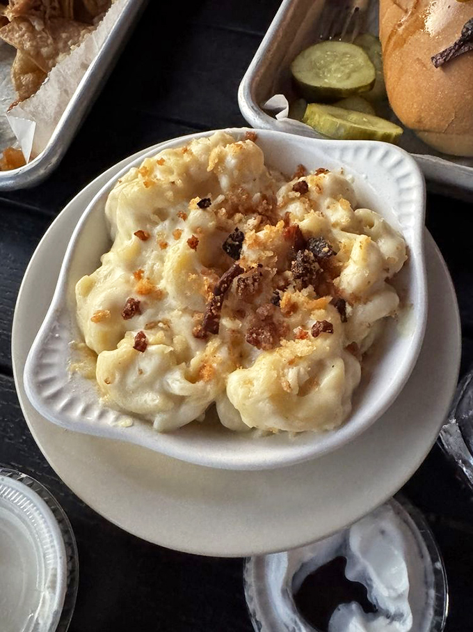 Mac and cheese that makes adults fight over the last bite. This isn't your childhood boxed version&mdash;it's a grown-up indulgence with toasted breadcrumbs that deserve their own fan club.