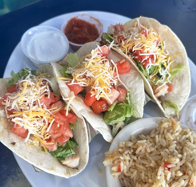 These fish tacos aren't just lunch&mdash;they're a vacation on a plate, complete with fresh salsa and Spanish rice that'll transport you straight to the tropics.