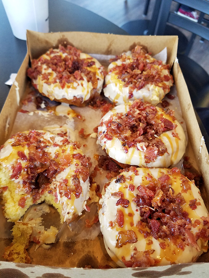 Maple bacon donuts: where breakfast meets dessert in perfect harmony. That crispy bacon on top is like jewelry for your donut.