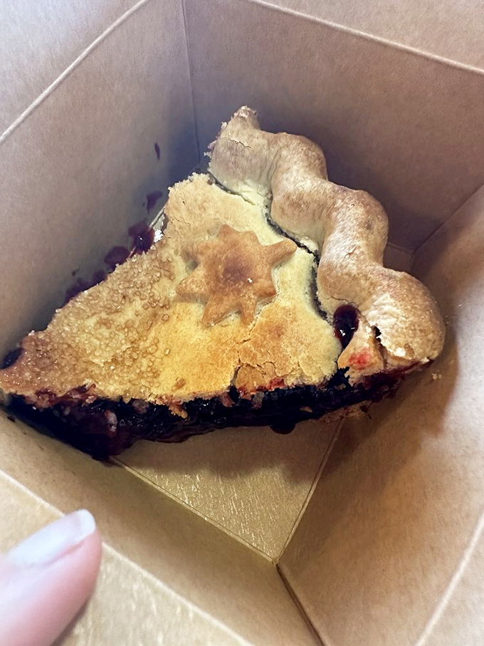 Pie that would make your grandmother both proud and jealous. That star-shaped crust detail? Pure kitchen poetry.