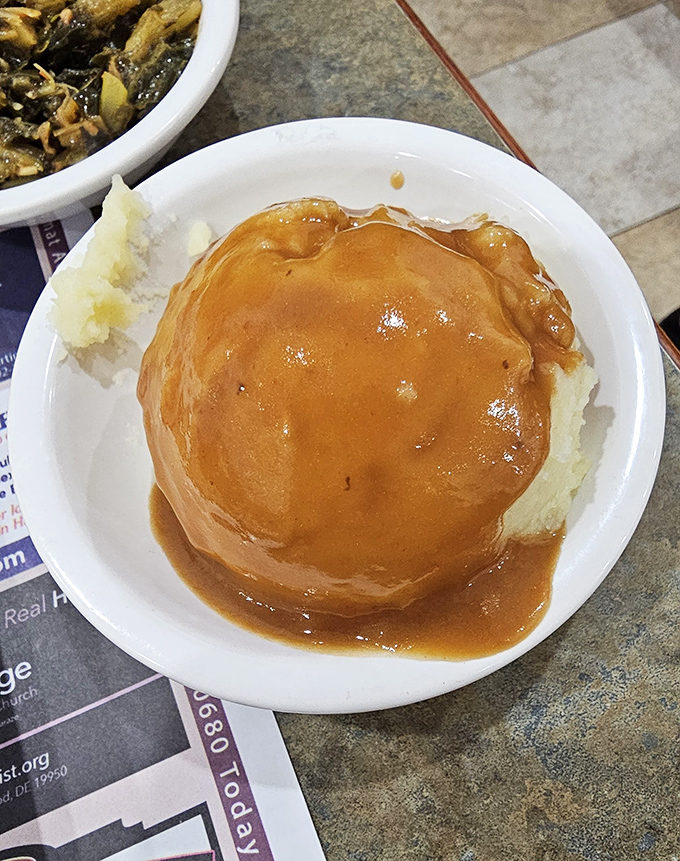 A mashed potato island drowning happily in gravy lake &ndash; the comfort food equivalent of winning the lottery. 