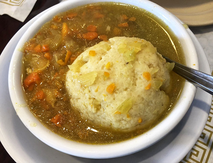 This matzo ball soup doesn't just warm your body&mdash;it recalibrates your soul with a baseball-sized dumpling floating majestically in golden broth. 