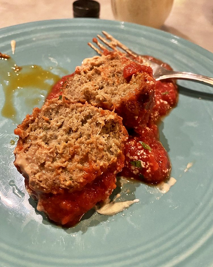 These meatballs don't just sit in sauce&mdash;they reign supreme on a throne of vibrant tomato, crowned with melty cheese and fresh herbs.