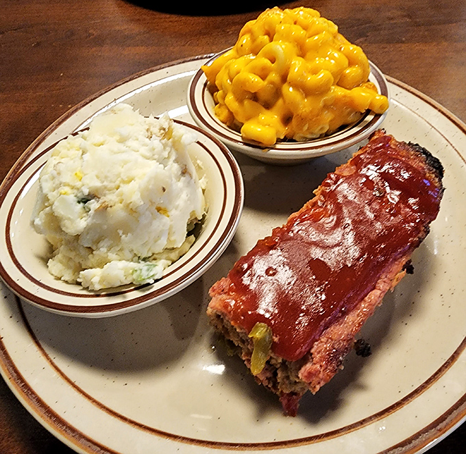 Meatloaf, mashed potatoes, and mac and cheese&mdash;the holy trinity of comfort food executed with a reverence that would make your grandmother both proud and slightly jealous.