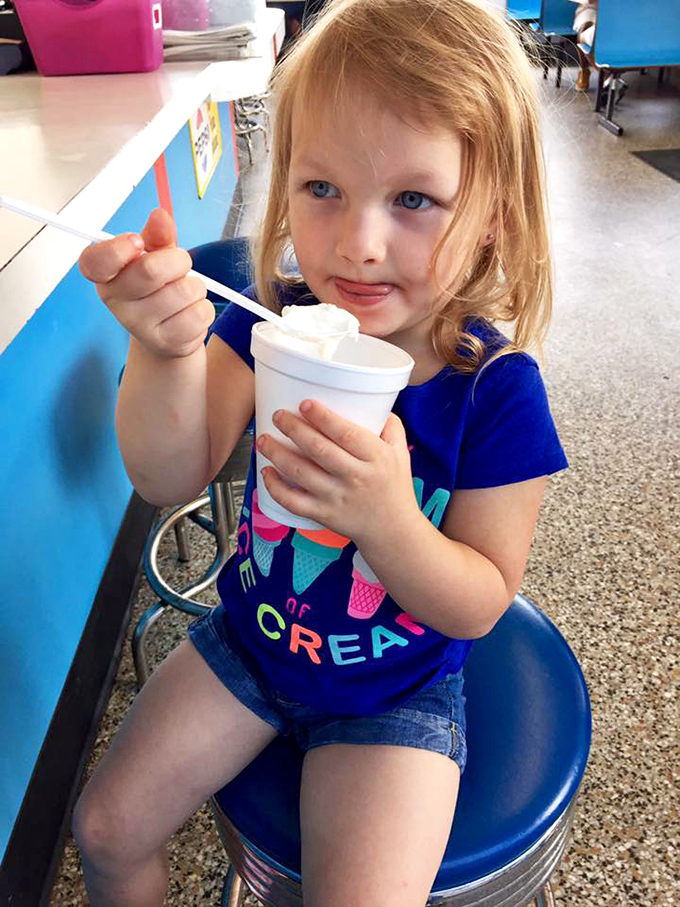 In a world of complicated desserts, there's something profoundly right about a simple milkshake enjoyed on a blue stool at a classic American institution.