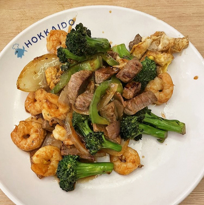 A perfect marriage of beef, shrimp, and vegetables dance together in this hibachi creation. Each bite tells a different delicious story.