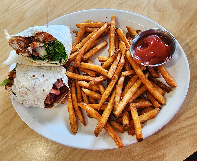 When a wrap meets sweet potato fries, it's like Fred Astaire found his Ginger Rogers in crispy, golden form.