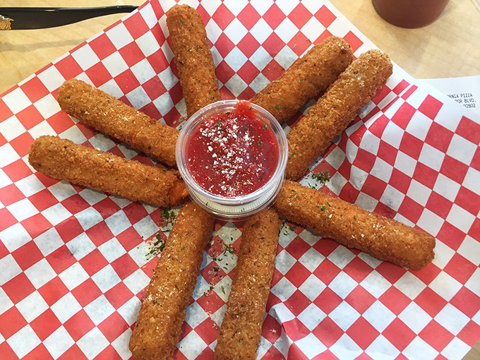 Not your average mozzarella sticks. Golden-brown perfection with a marinara dip that makes these crispy wonders disappear faster than you can say "cheese."