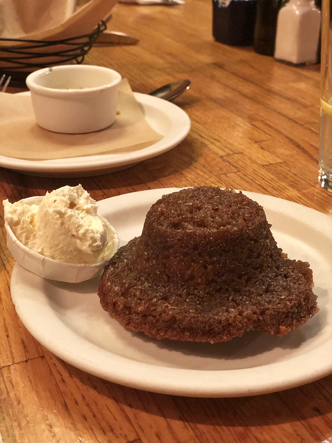 This isn't just a muffin; it's a chocolate revelation with a side of whipped butter that makes you question why you ever settled for toast.
