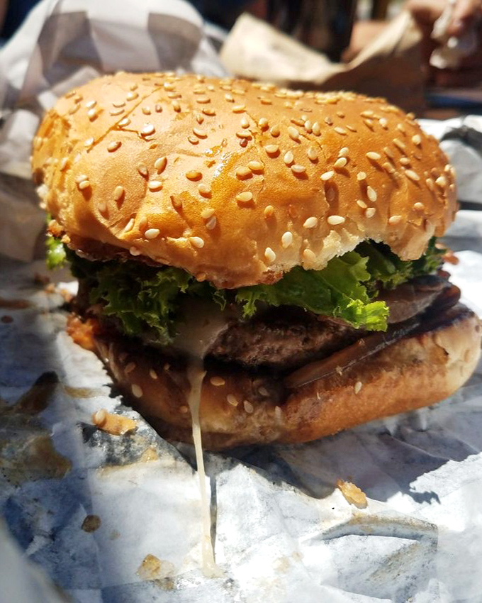 Not all heroes wear capes, but this burger wears a sesame seed crown worthy of Tahoe royalty.
