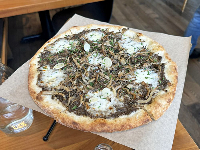 Mushroom lovers, rejoice! This funghi pizza is what happens when woodland flavors meet artisanal dough. The umami is practically visible.