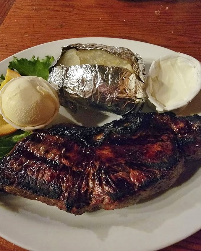 A proper steak doesn't need fancy garnishes&mdash;just a baked potato in foil, a dollop of sour cream, and the confidence to be exactly what it is.
