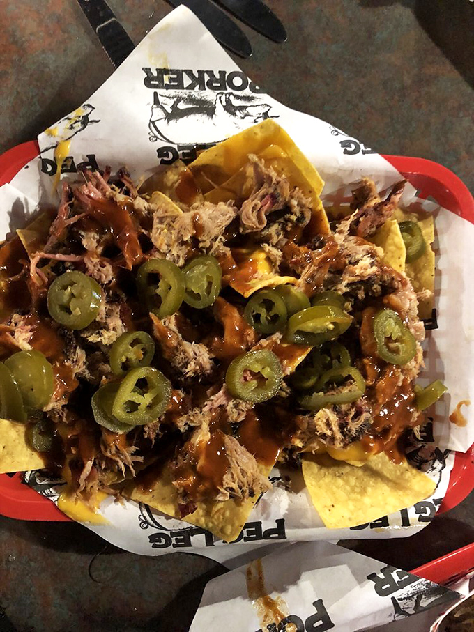 BBQ nachos: where Tennessee tradition meets Tex-Mex in a beautiful marriage of pulled pork, jalape&ntilde;os, and cheese that defies cultural boundaries.