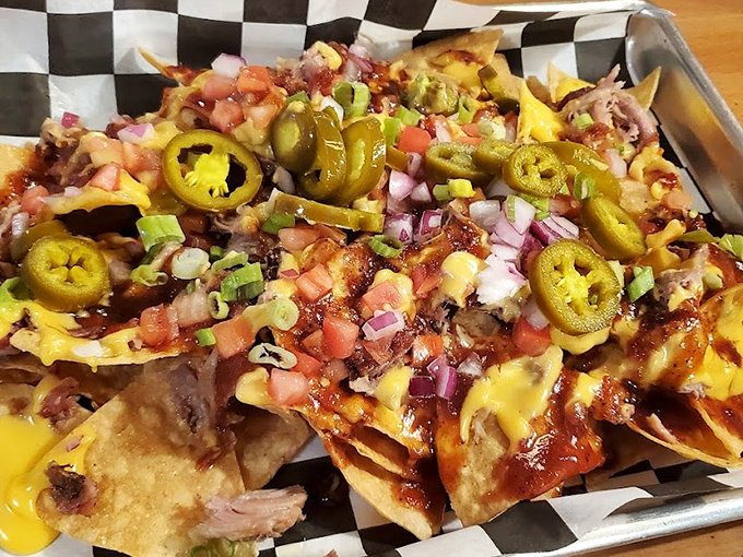 BBQ nachos that make sharing impossible. That pulled pork nestled among jalape&ntilde;os and cheese creates neighborhood disputes over the last chip.