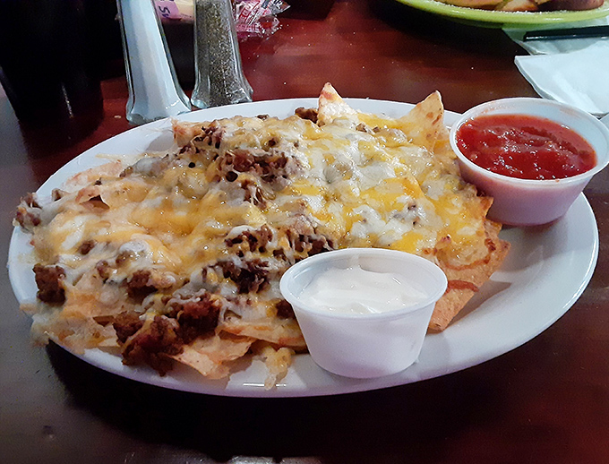 Mountains of melted cheese and toppings transform tortilla chips into a meal that feeds your soul.