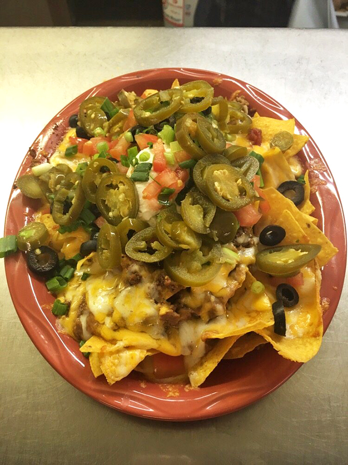 Nachos Supreme: where every chip is fighting for the title of "Most Delicious Bite" and there are no wrong choices.