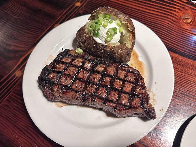 That crosshatch grill pattern isn't just for show&mdash;it's the signature of a steak that's been kissed by fire just the right amount of time.
