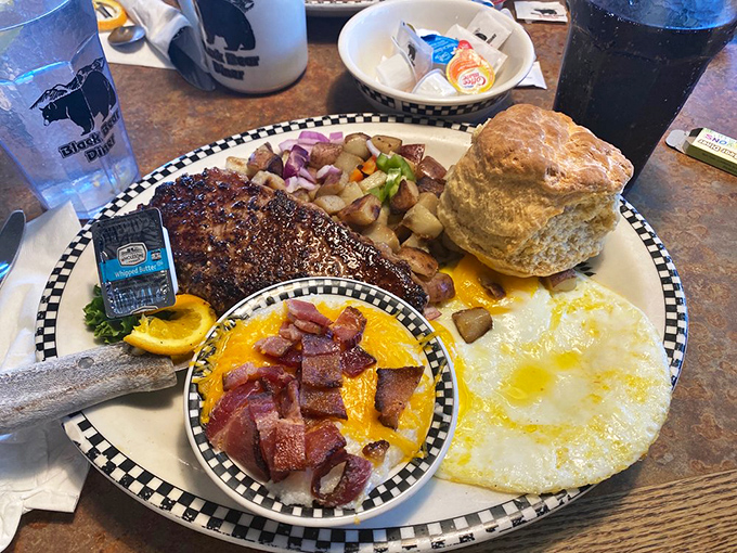 The breakfast of champions—or at least people who won't need to eat again until dinner. That steak looks like it's auditioning for a meat lover's magazine cover.