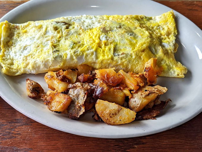 An omelet that puts hotel breakfast buffets to shame. Those home fries aren't just a side dish&mdash;they're the supporting actor who steals the show.